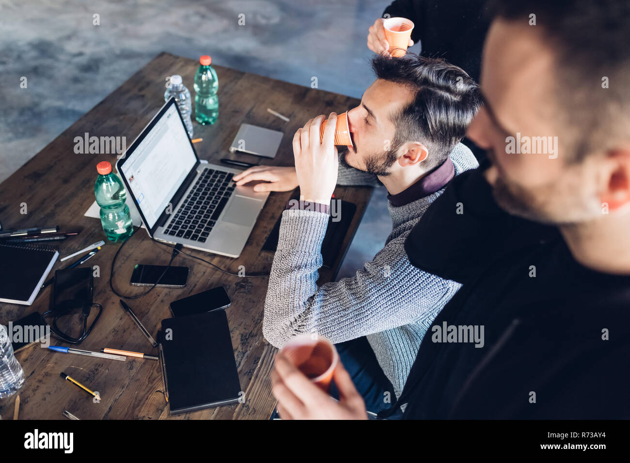 Designers brainstorming in studio Stock Photo - Alamy