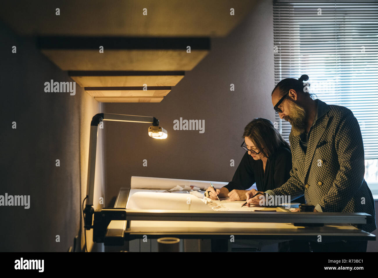 Hard working couple hi-res stock photography and images - Alamy