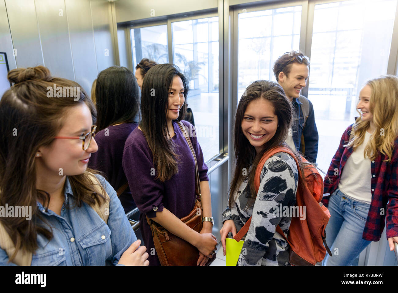 Inside elevator talking hi-res stock photography and images - Alamy