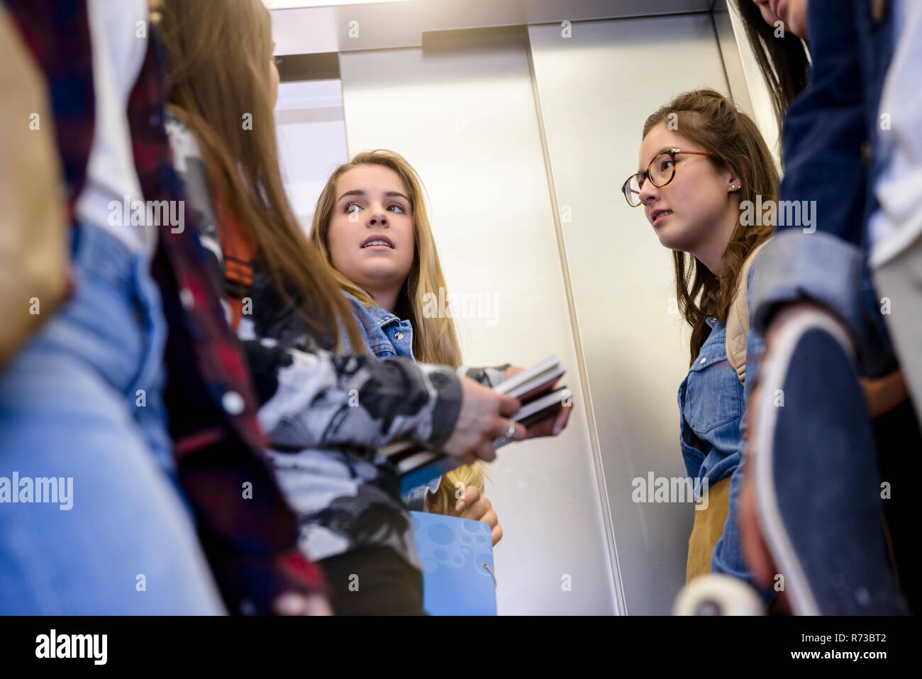 Inside elevator talking hi-res stock photography and images - Alamy