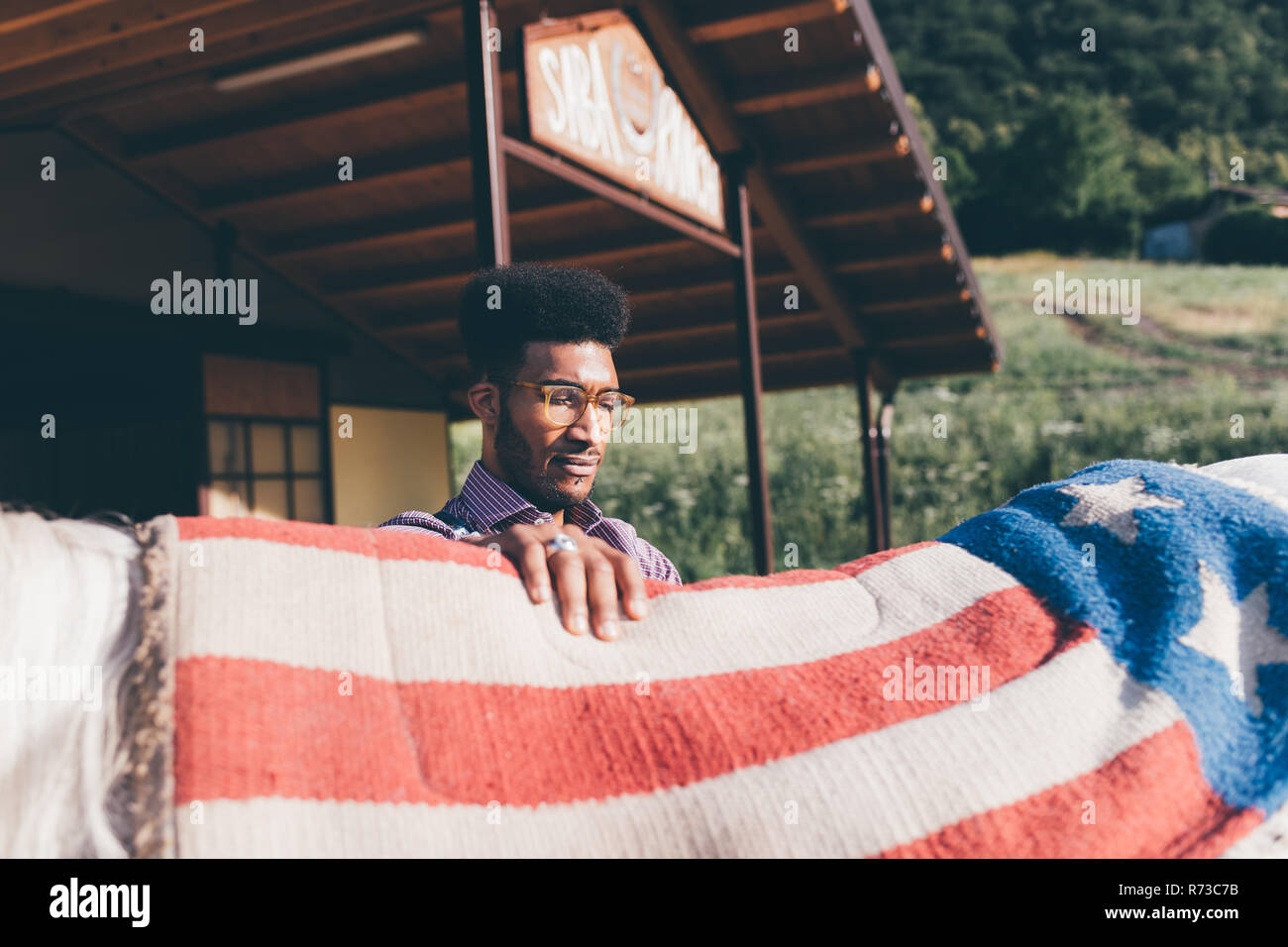 Back view of man with american flag hi-res stock photography and images ...