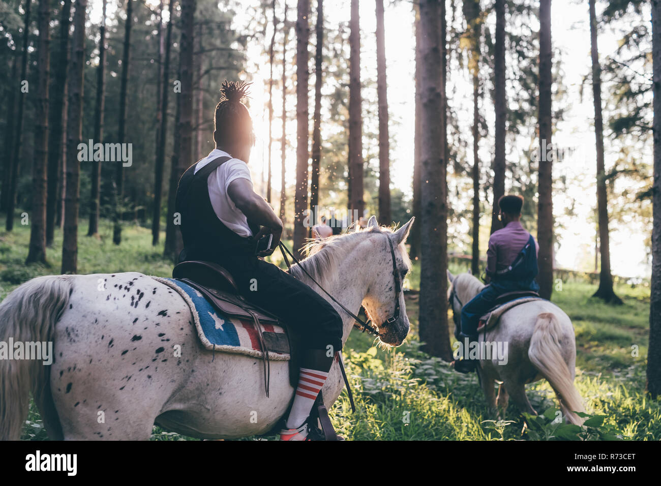 Two men sharing horse hi-res stock photography and images - Alamy