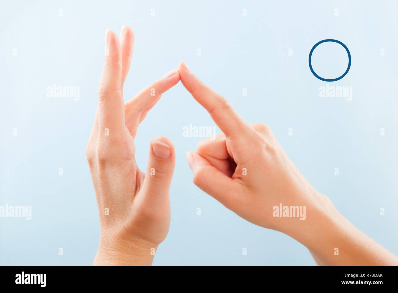 Two handed sign language hi-res stock photography and images - Alamy