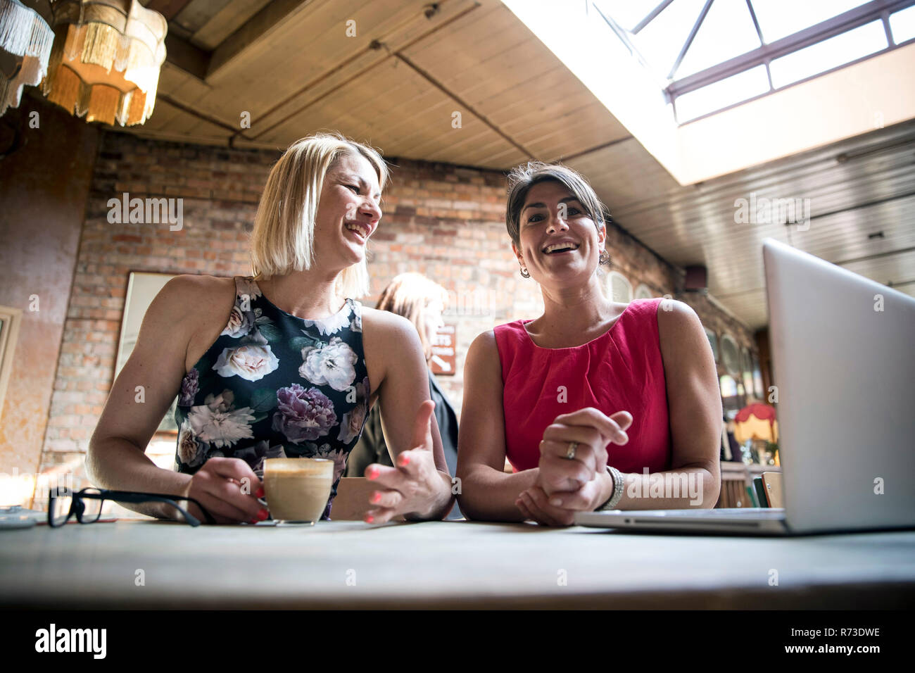 Women brainstorming business ideas in restaurant Stock Photo - Alamy
