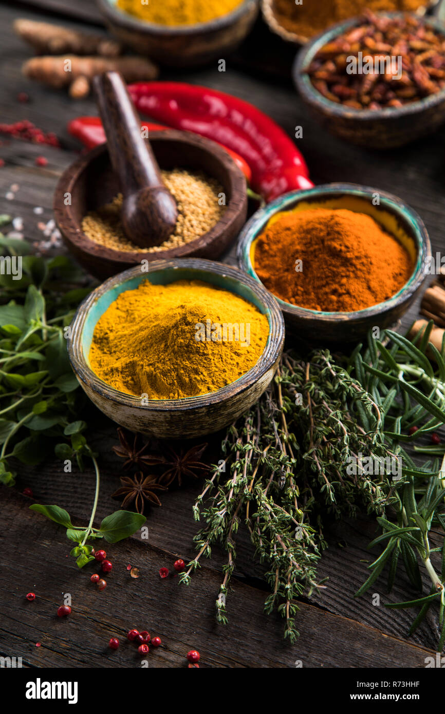 Wooden bowl, Hot spices Stock Photo - Alamy