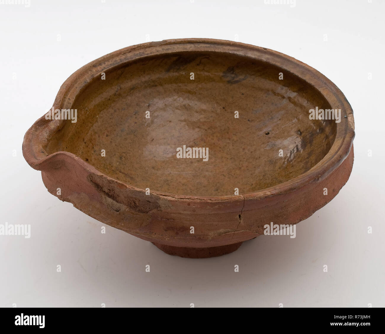 Earthenware bowl with wide shank on stand, partly glazed, bowl crockery ...