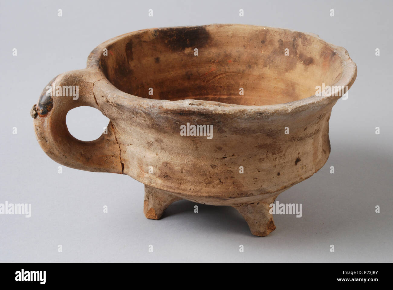 Earthenware fire test, unglazed, vertical band, on three legs, fire ...