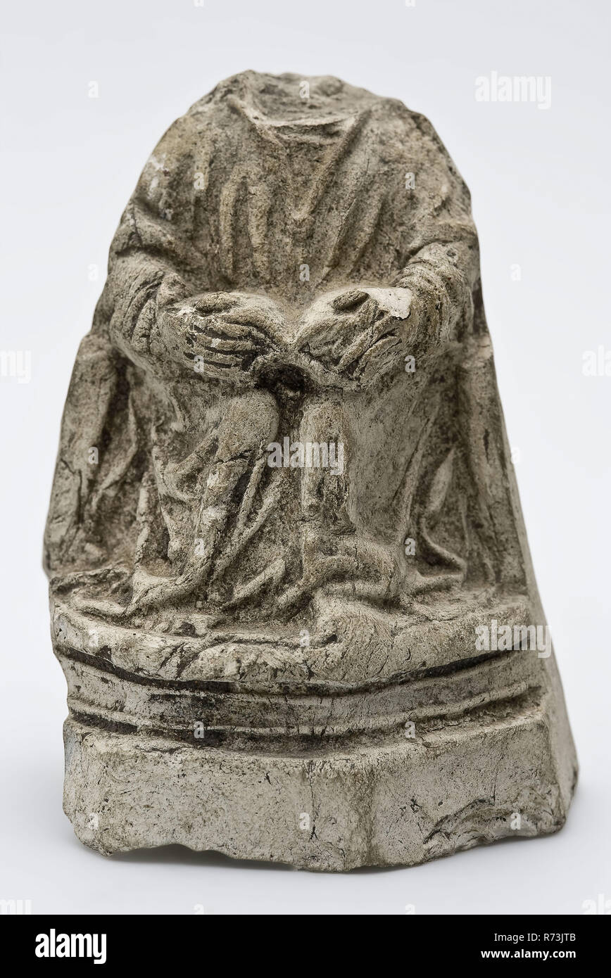 Pipe-shaped statue, figure in long cloak, seated on chair, with book on ...