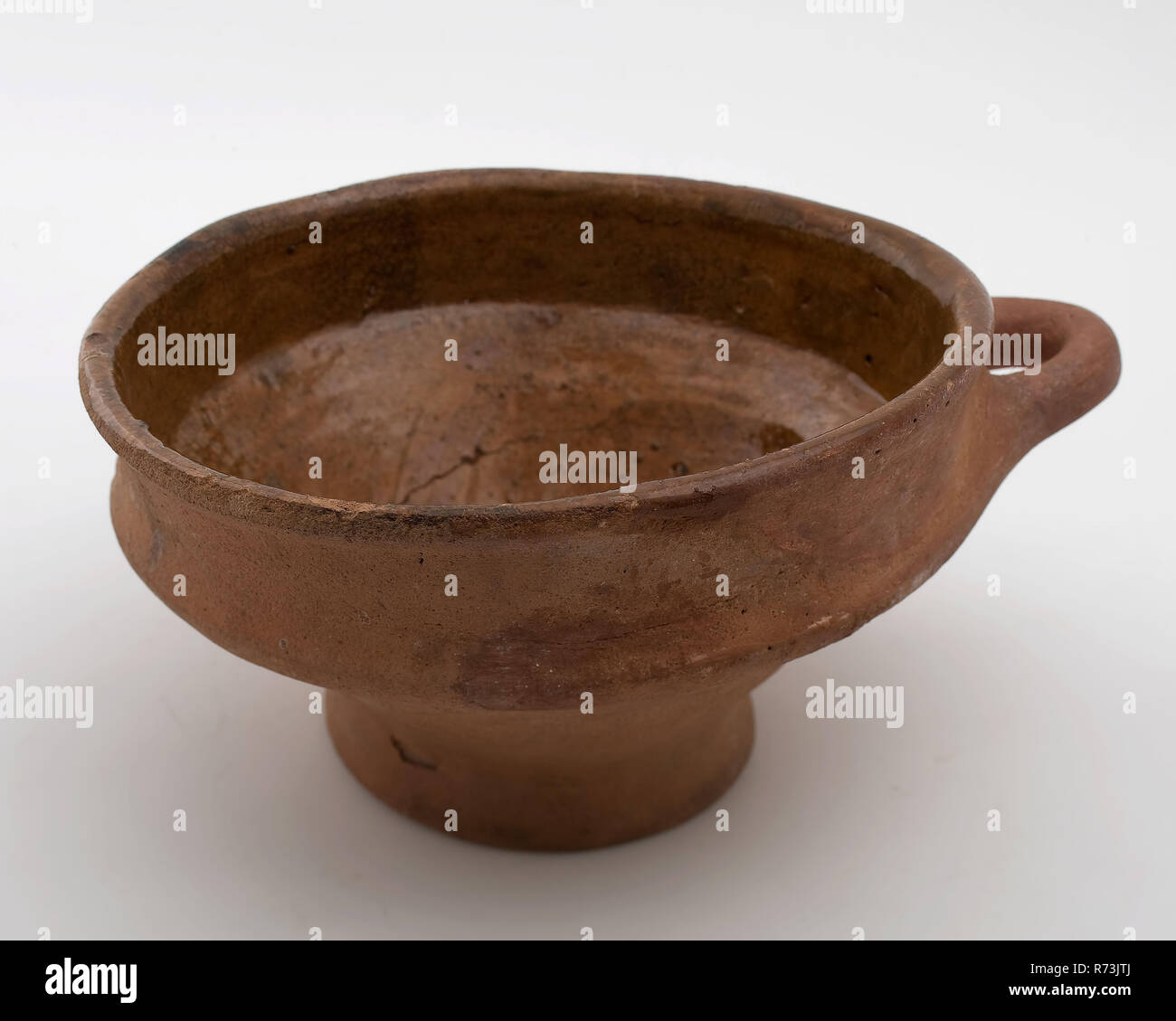 Earthenware bowl, red shard, sausage ear, internal lead glaze, on stand, porcelain crockery ...