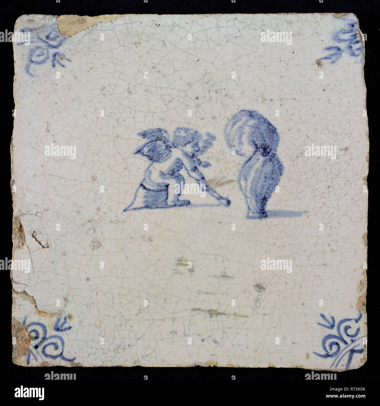 White tile with blue putto; corner pattern ox head, wall tile tile ...