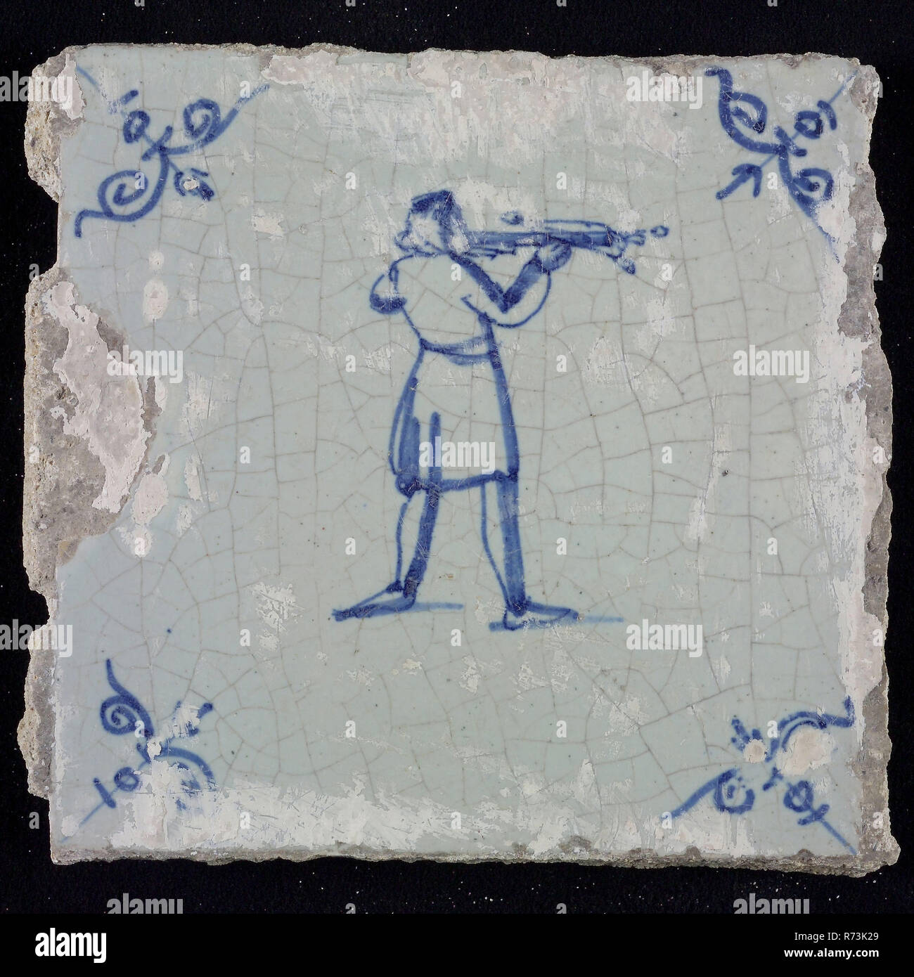 White tile with blue warrior shooting with crossbow; corner pattern ox ...