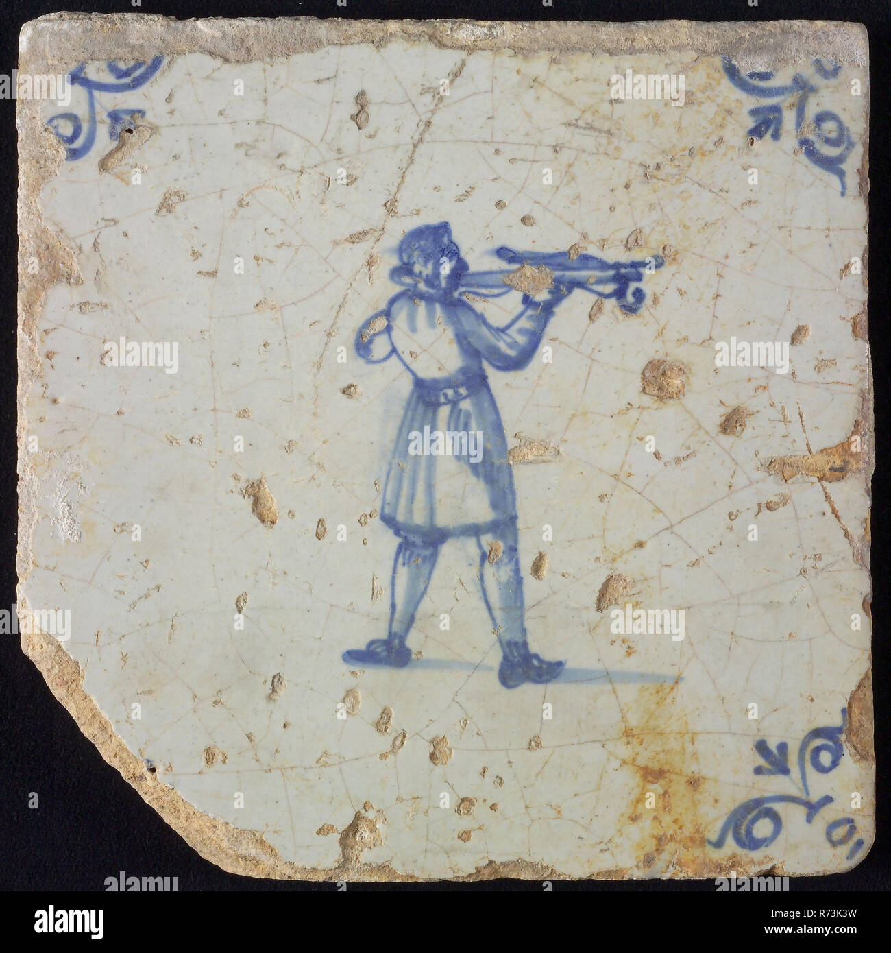 White tile with blue warrior shooting with crossbow; corner pattern ox ...