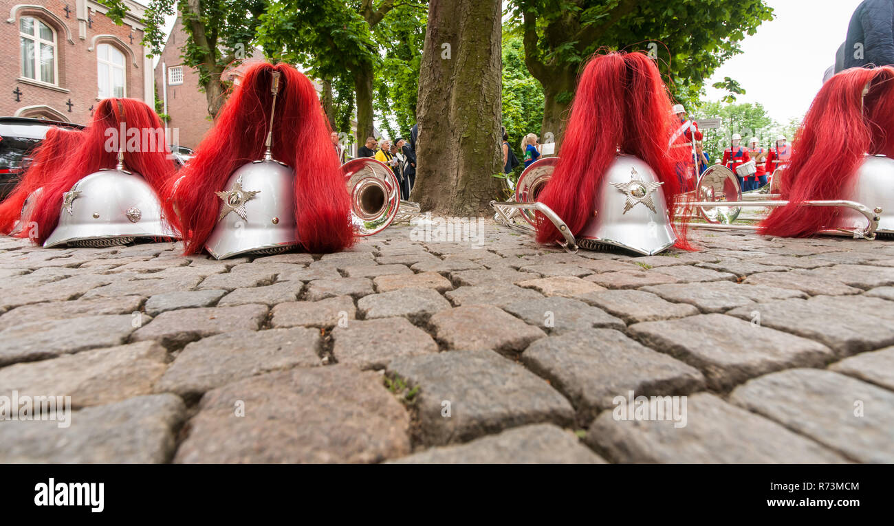 Details from a music, show and marching band. Composition of helmets ...