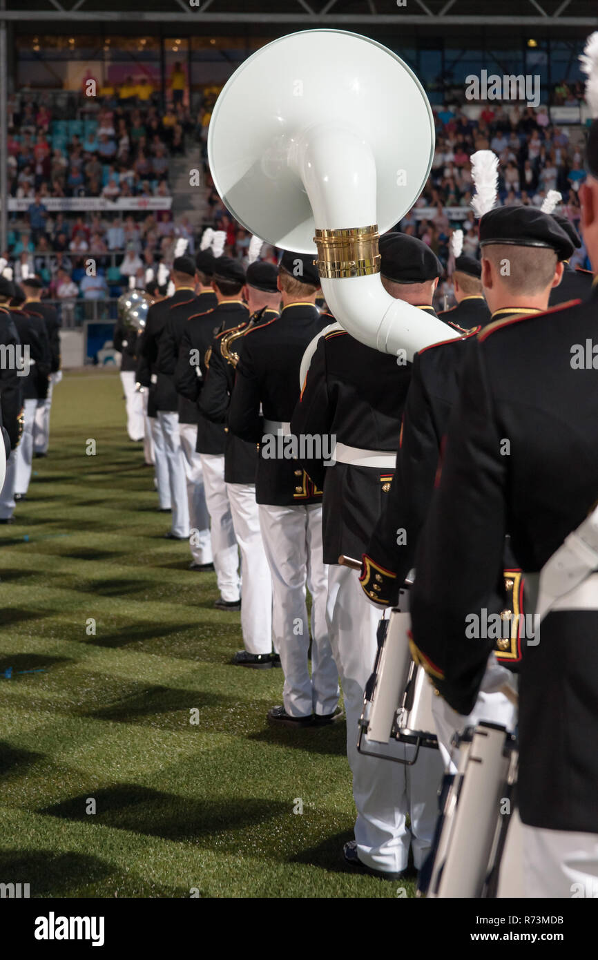 Details from a music band. Playing musicians with wind instruments and ...