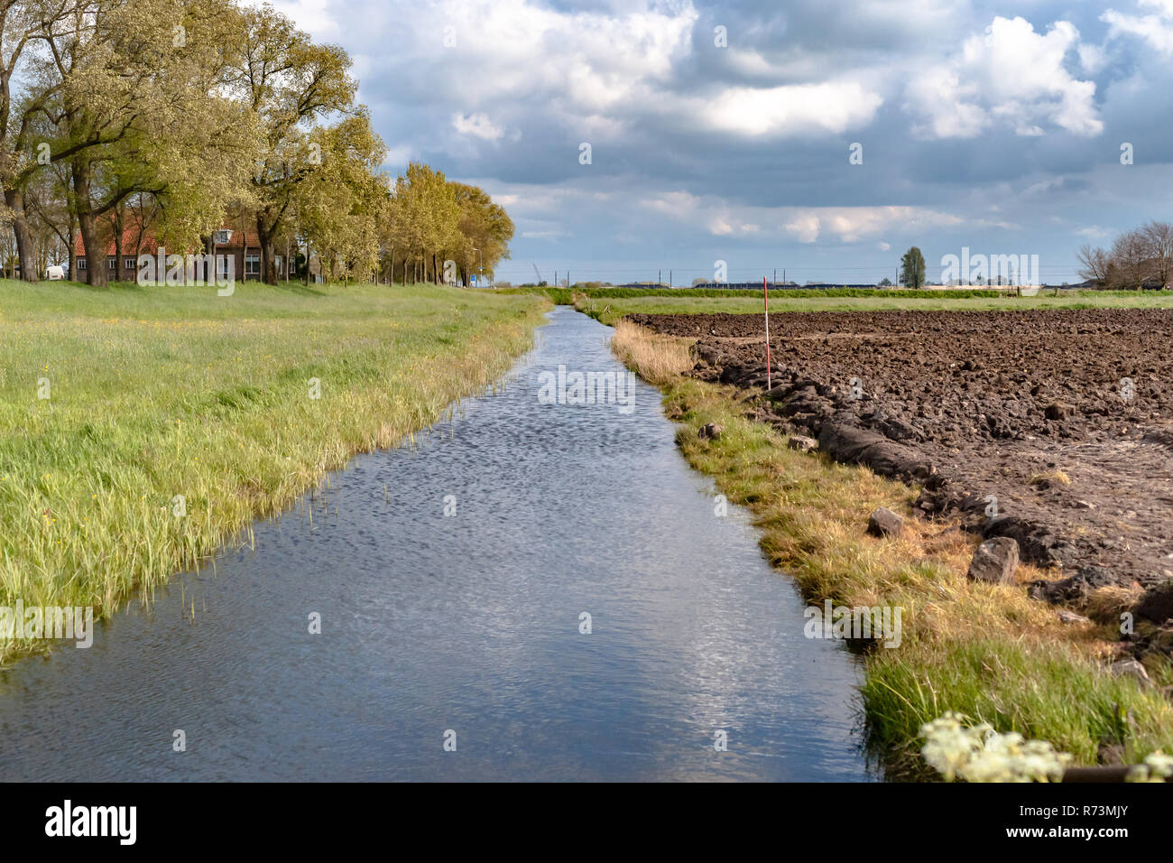 Old Dutch Sea Dike near Kampen Hanseatic City. View of the polders and ...