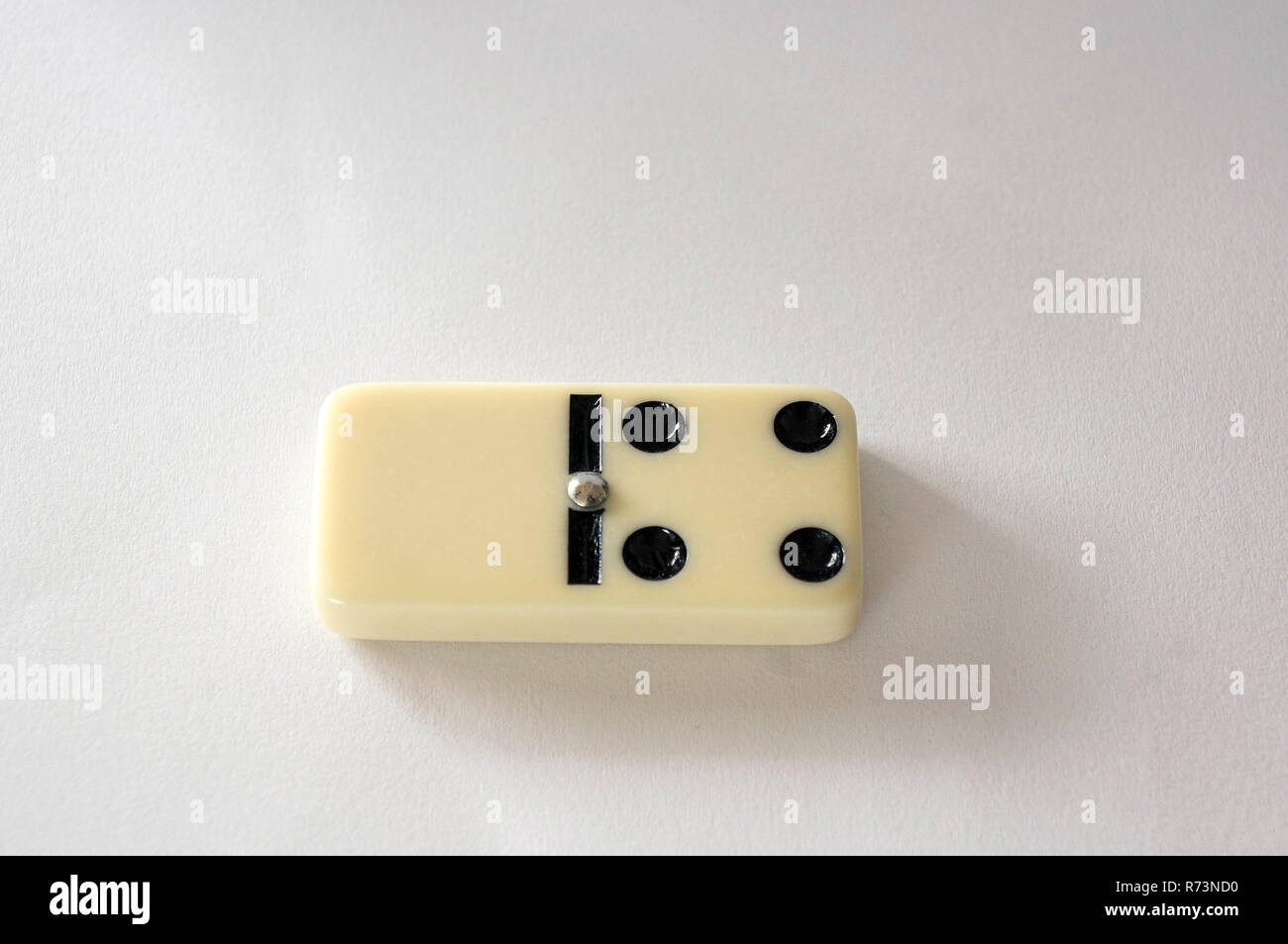 domino white background four zero game piece Stock Photo - Alamy