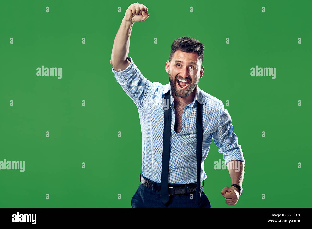 Winning success man happy ecstatic celebrating being a winner. Dynamic ...