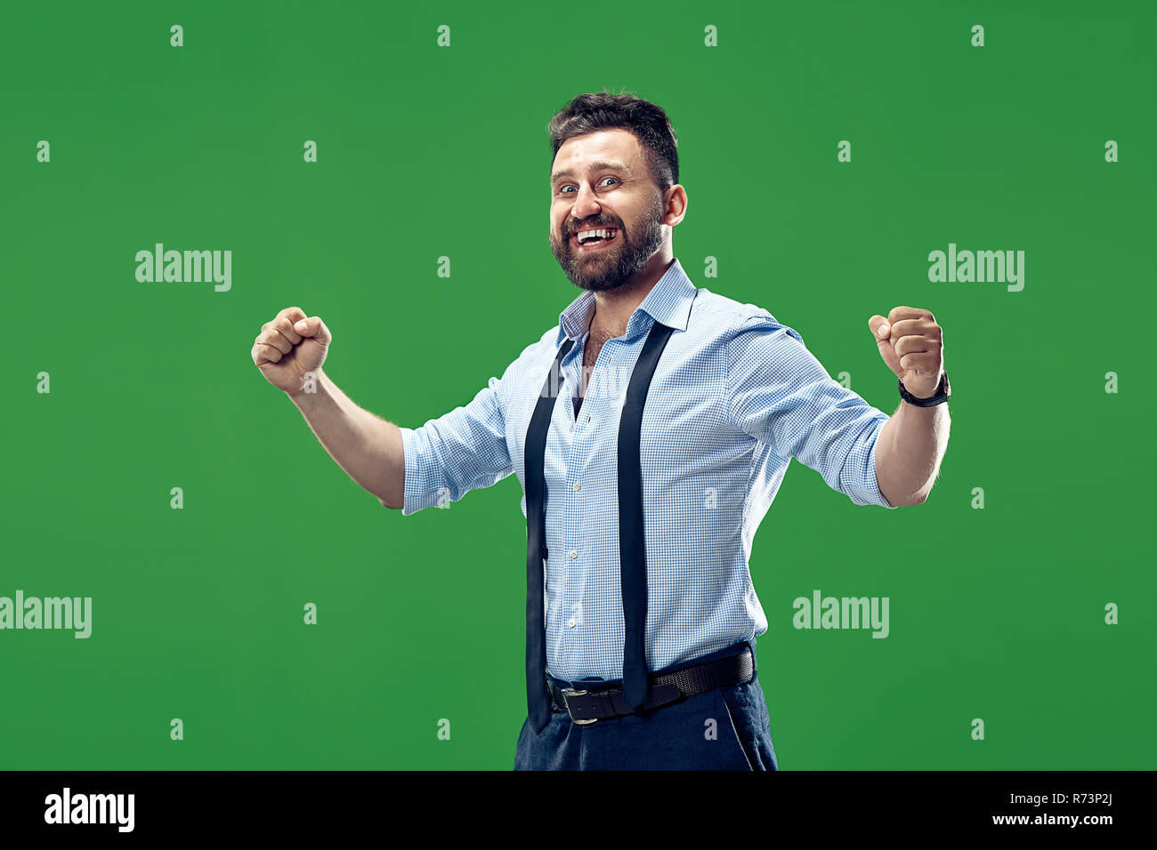 Winning success man happy ecstatic celebrating being a winner. Dynamic ...