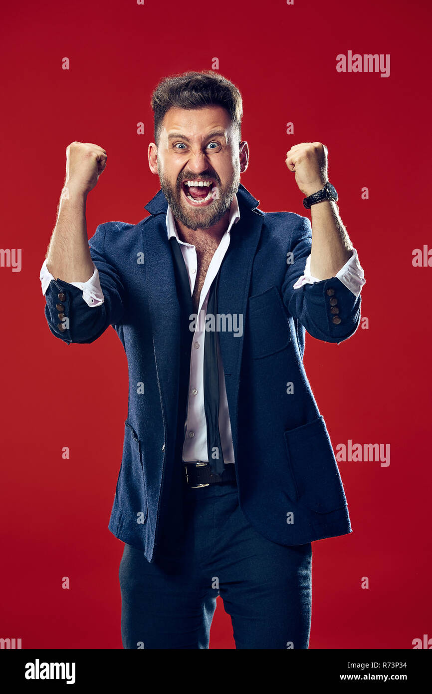 Winning success man happy ecstatic celebrating being a winner. Dynamic ...