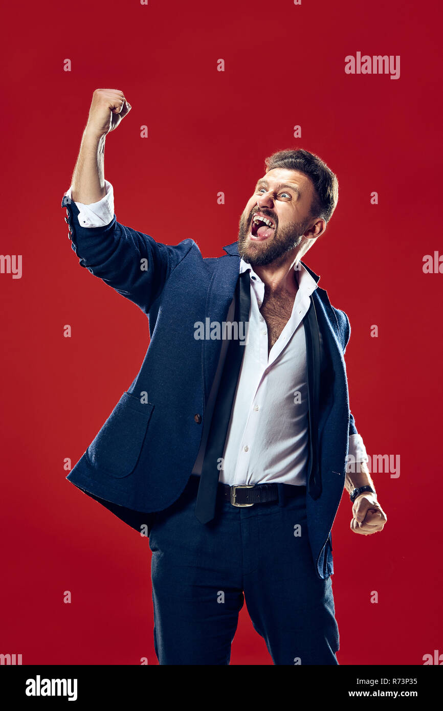 Winning success man happy ecstatic celebrating being a winner. Dynamic ...