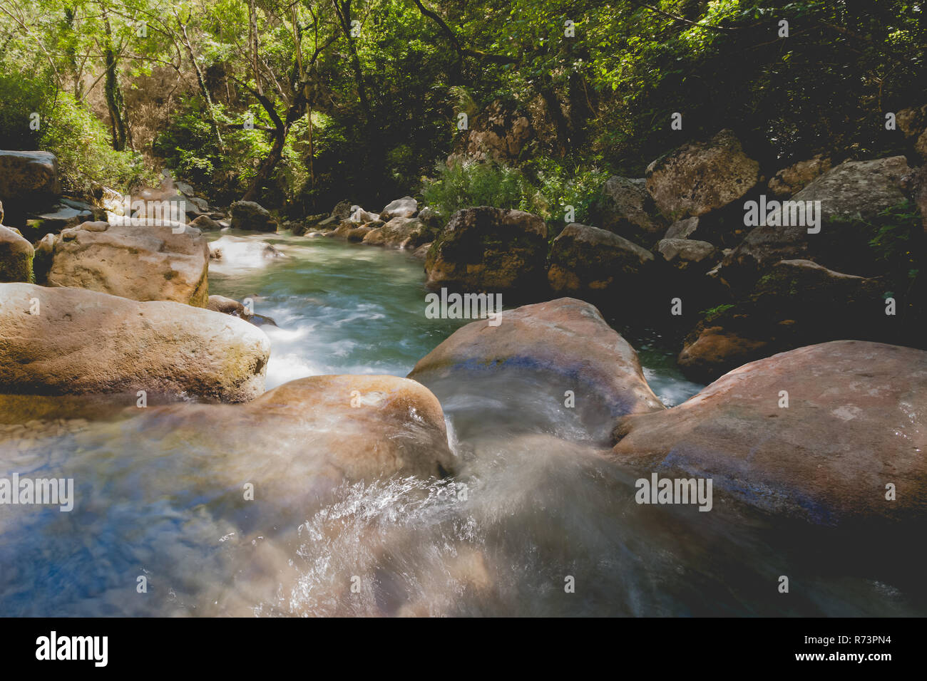 Photo from mountain river that runs usually in mountains, in narrow ...