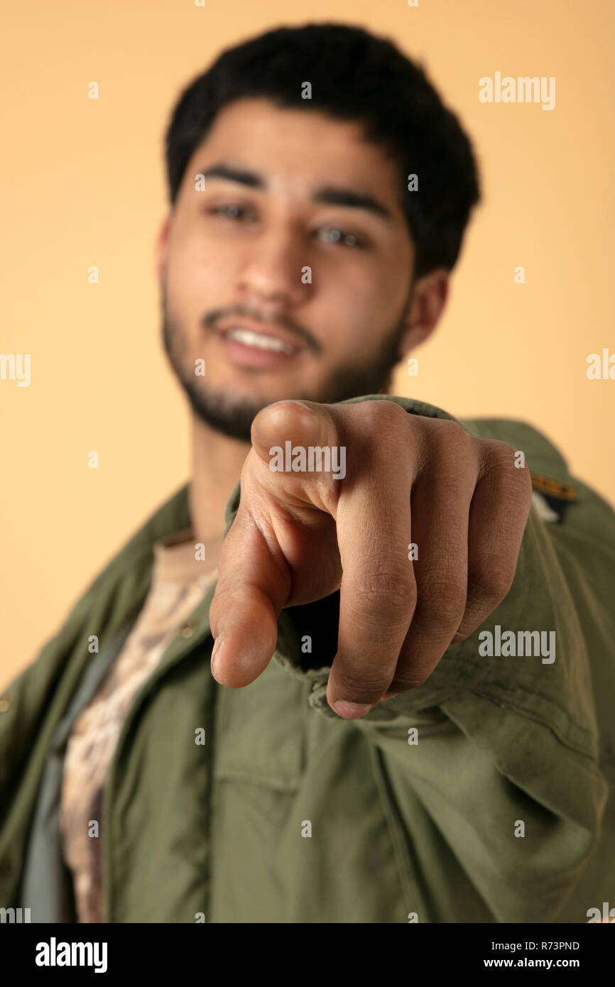 man points with finger into camera Stock Photo - Alamy