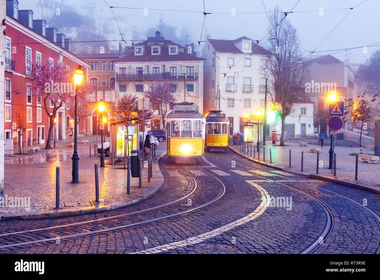 Yellow 28 tram in Alfama, Lisbon, Portugal Stock Photo - Alamy