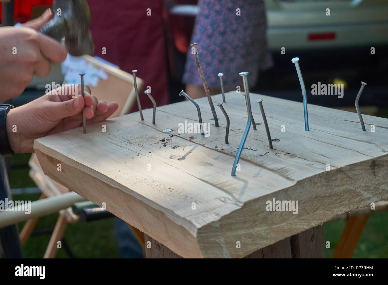 Hammering nail hammer wooden block hi-res stock photography and images ...