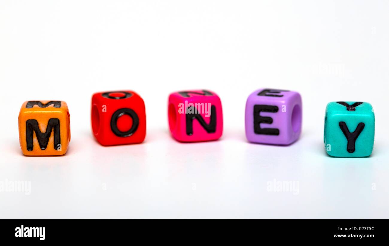 money - made from multicolored child toy cubes with letters Stock Photo ...