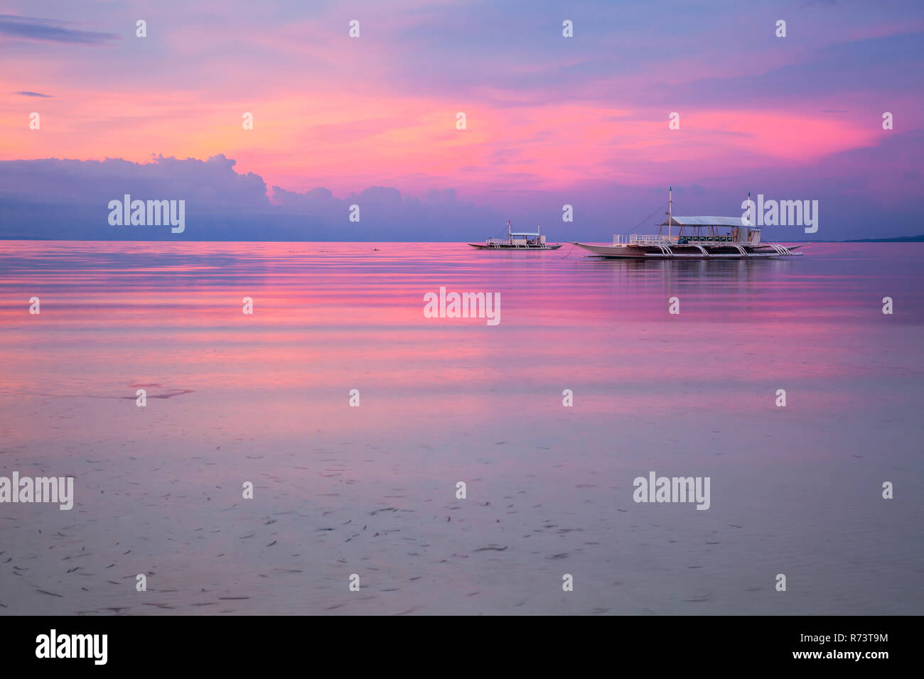 Stunning view of the sunset on the Philippine beach. Doljo beach ...