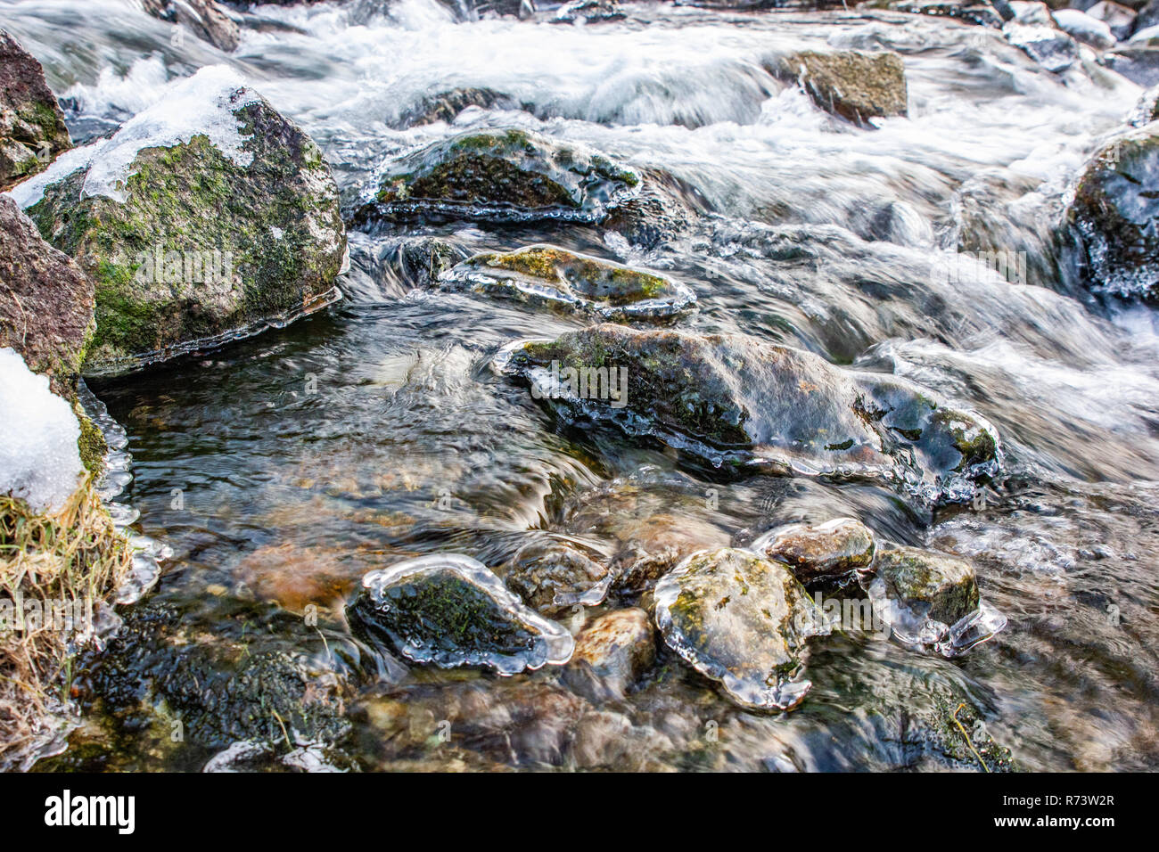 River with rock and ice hi-res stock photography and images - Alamy