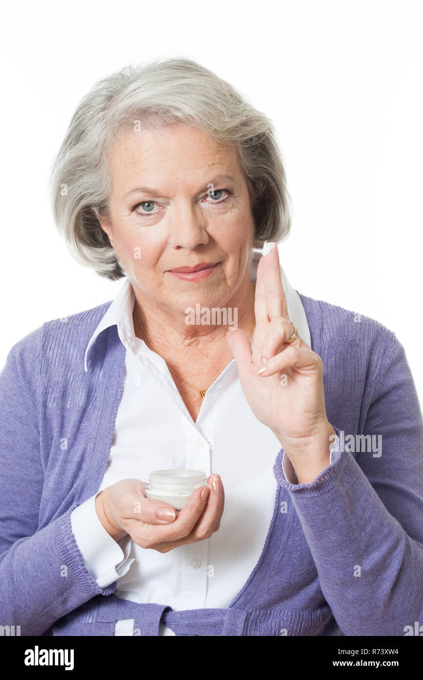 Putting cream hi-res stock photography and images - Alamy