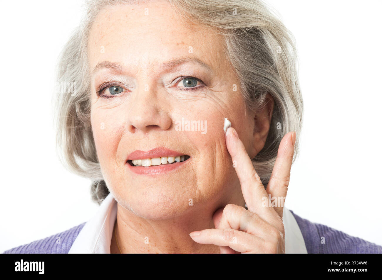 Woman putting cream hi-res stock photography and images - Alamy