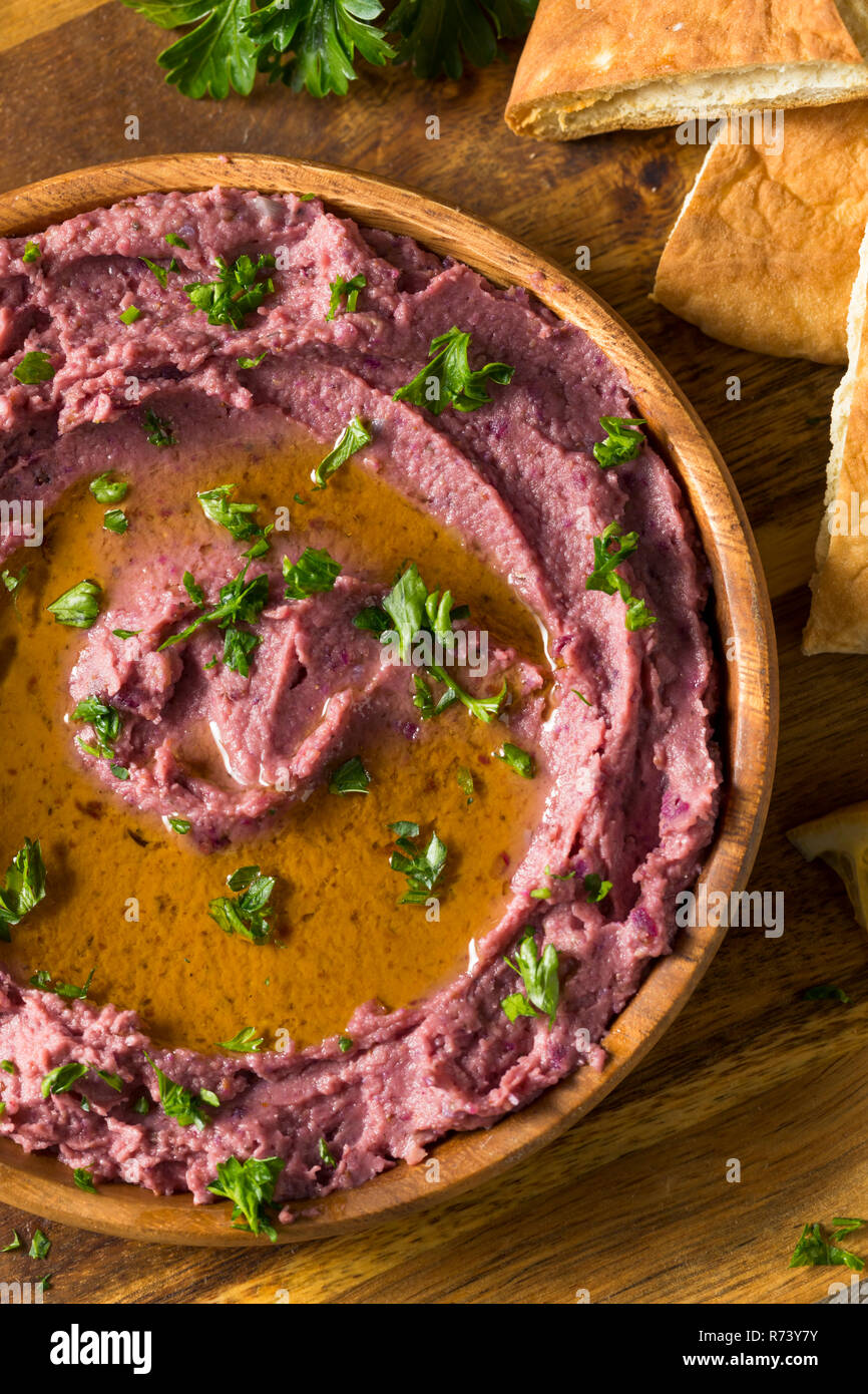 Homemade Purple Hummus with Olive Oil and Pita Chips Stock Photo - Alamy
