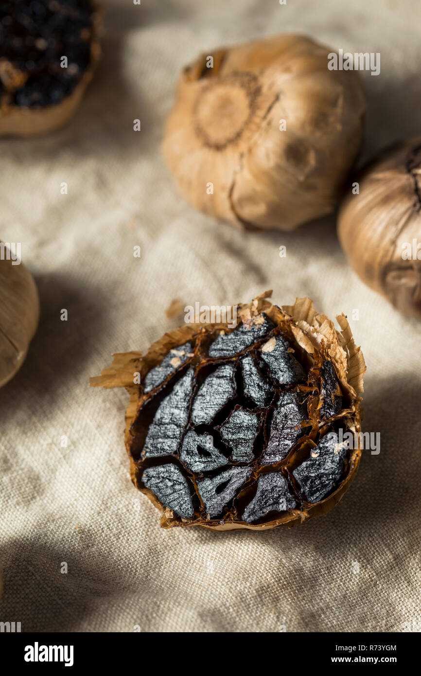 Organic Fermented Black Garlic Ready to Cook With Stock Photo - Alamy