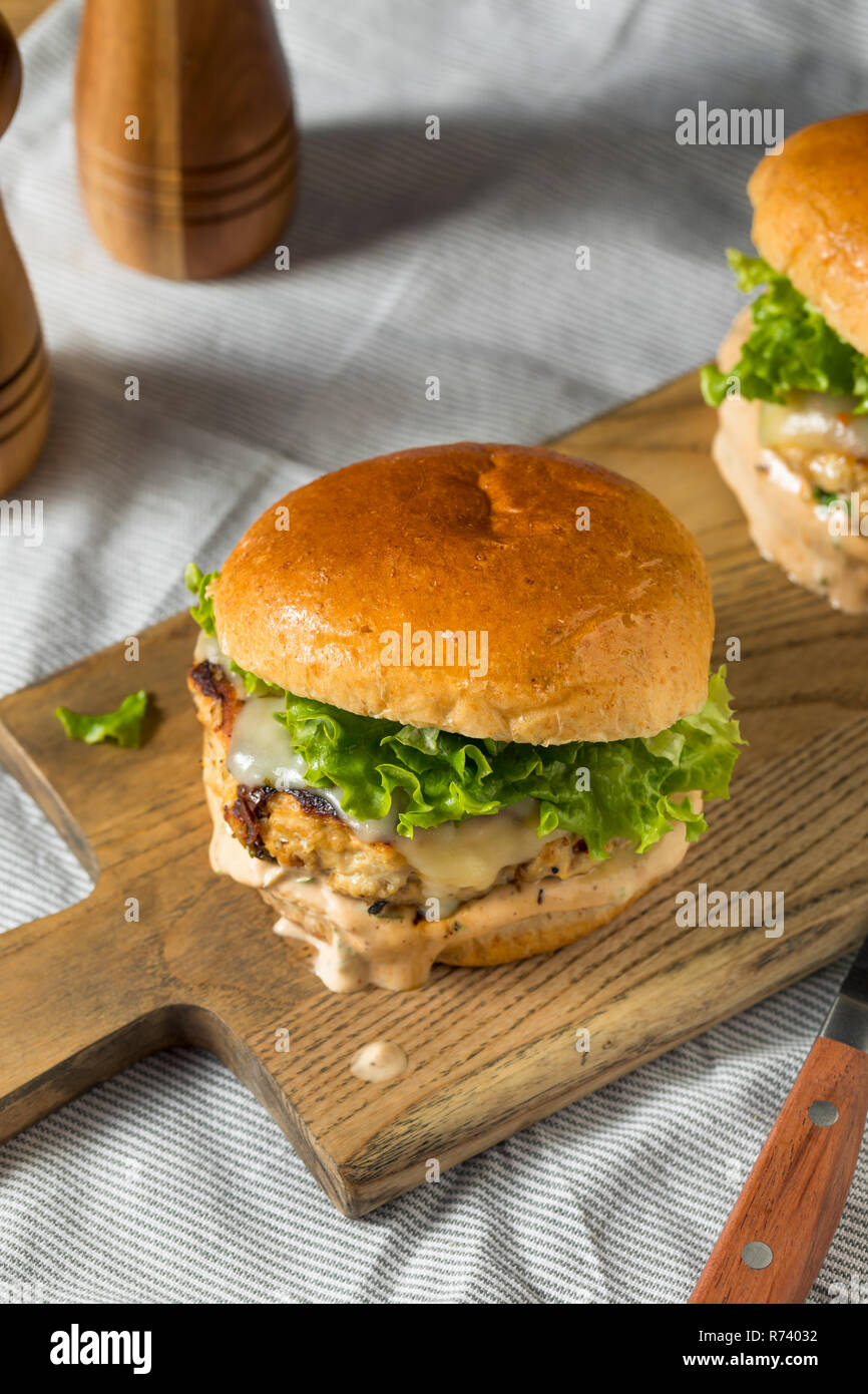 Spicy Homemade Chipotle Chicken Burger with Lettuce Stock Photo - Alamy