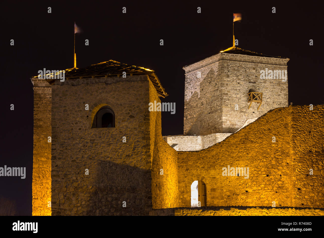 First lights on the towers of ancient Momcilov grad fortress in Pirot ...
