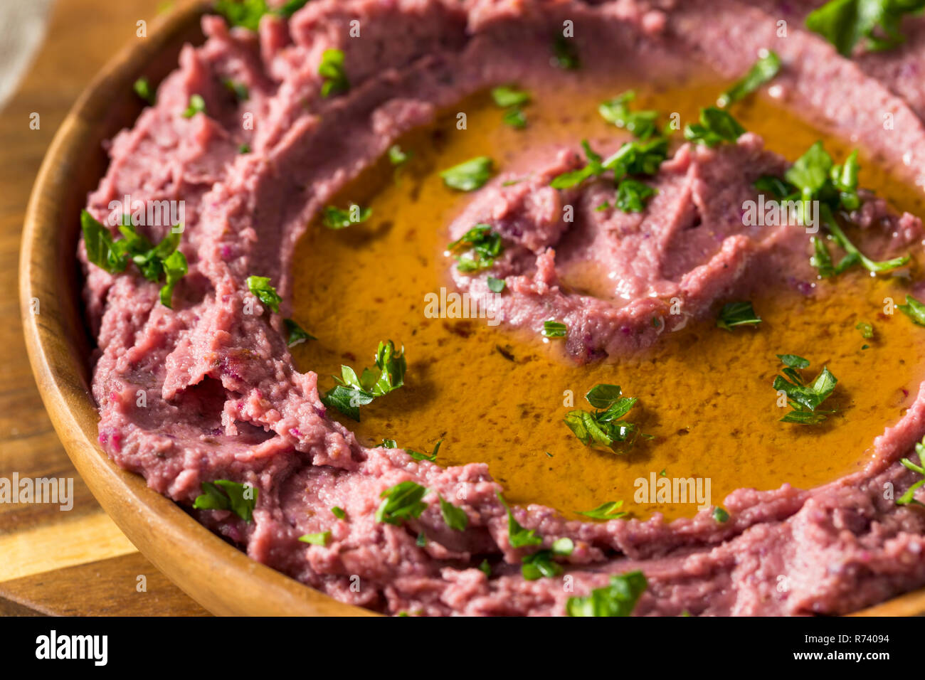 Homemade Purple Hummus with Olive Oil and Pita Chips Stock Photo - Alamy