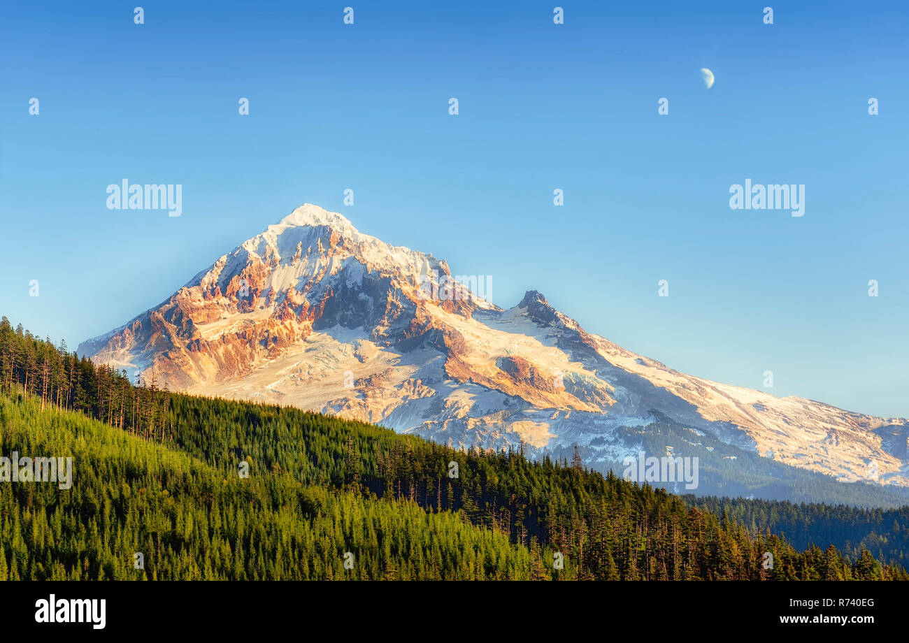 A quarter Moon over Mt. Hood as the day draws to an end Stock Photo - Alamy