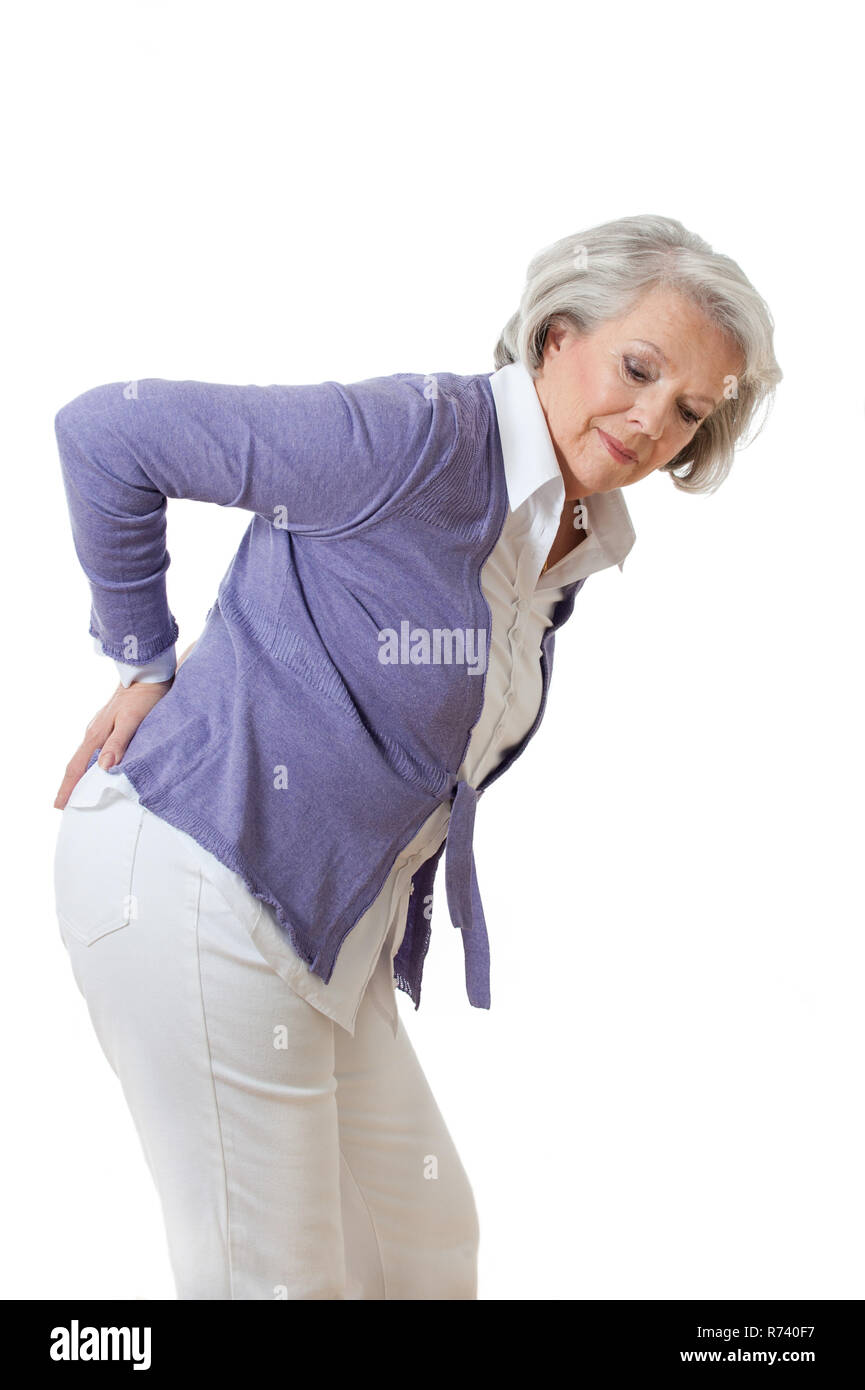 Senior woman with back pain Stock Photo - Alamy