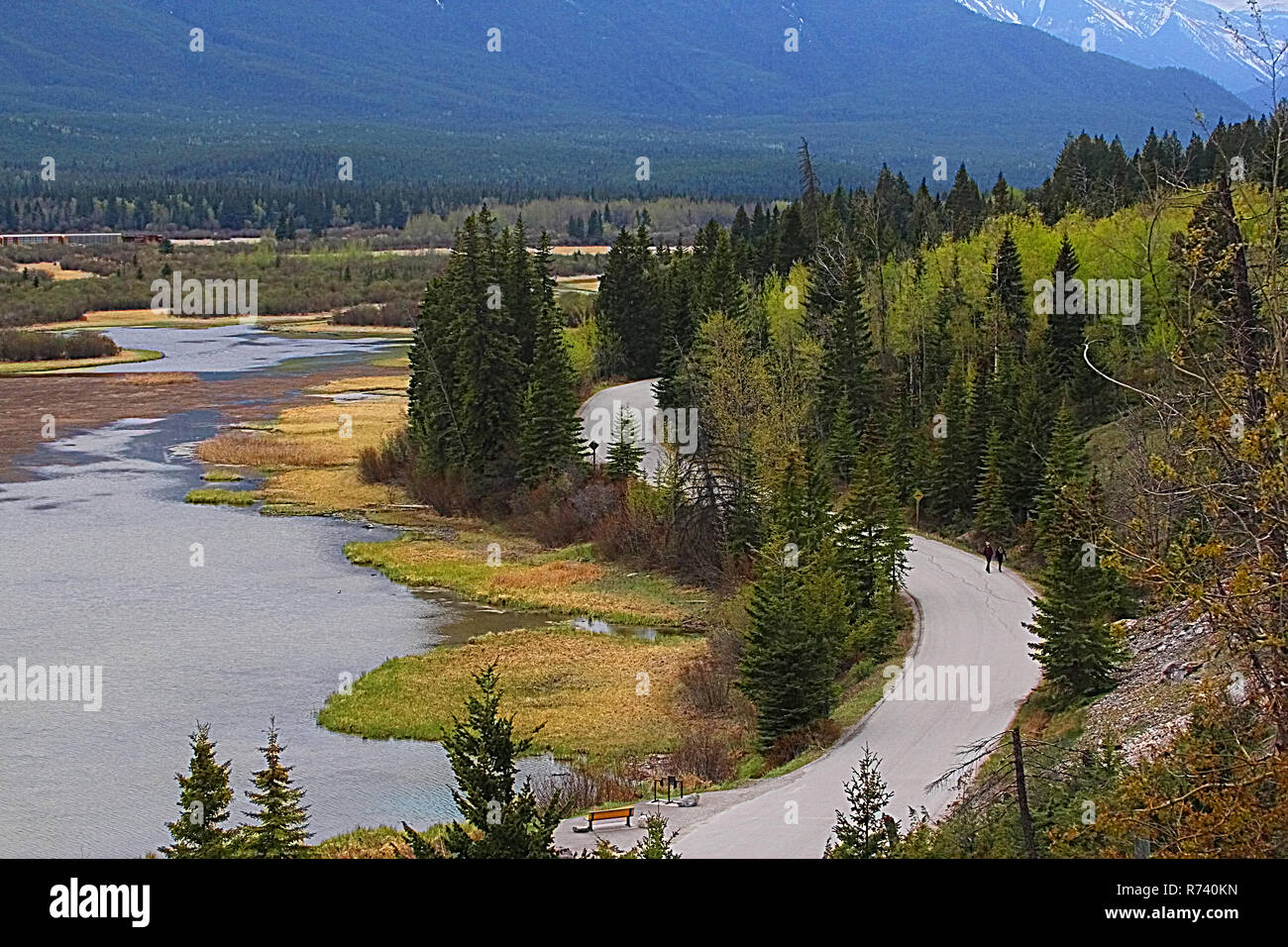 Two people hiking along the Vermillion Lakes road, Banff National Park ...