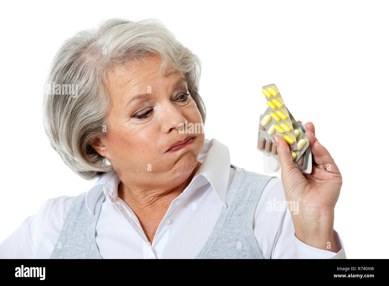 Older woman with many tablets Stock Photo - Alamy