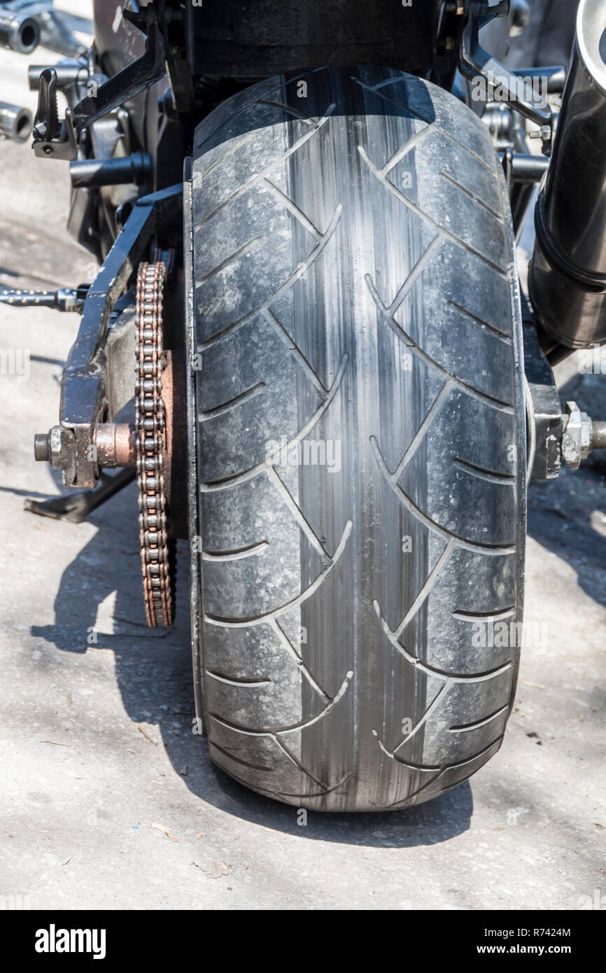 Giant Motorcycle tire with signs of some burning Stock Photo - Alamy
