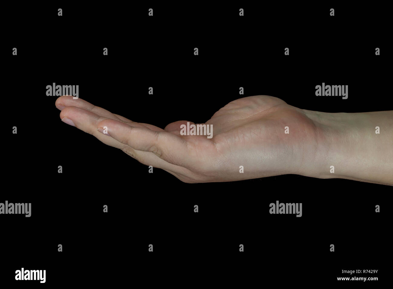 Cupped human hand isolated on black background Stock Photo - Alamy