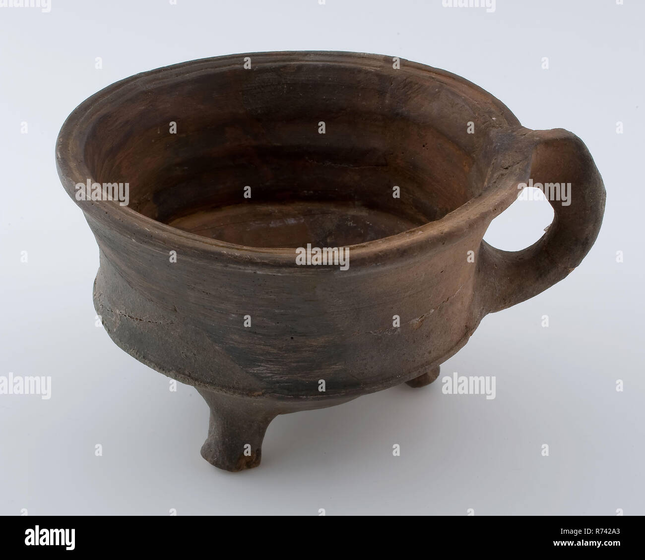 Pottery test on three legs, unglazed, test kitchen utensils earthenware ...