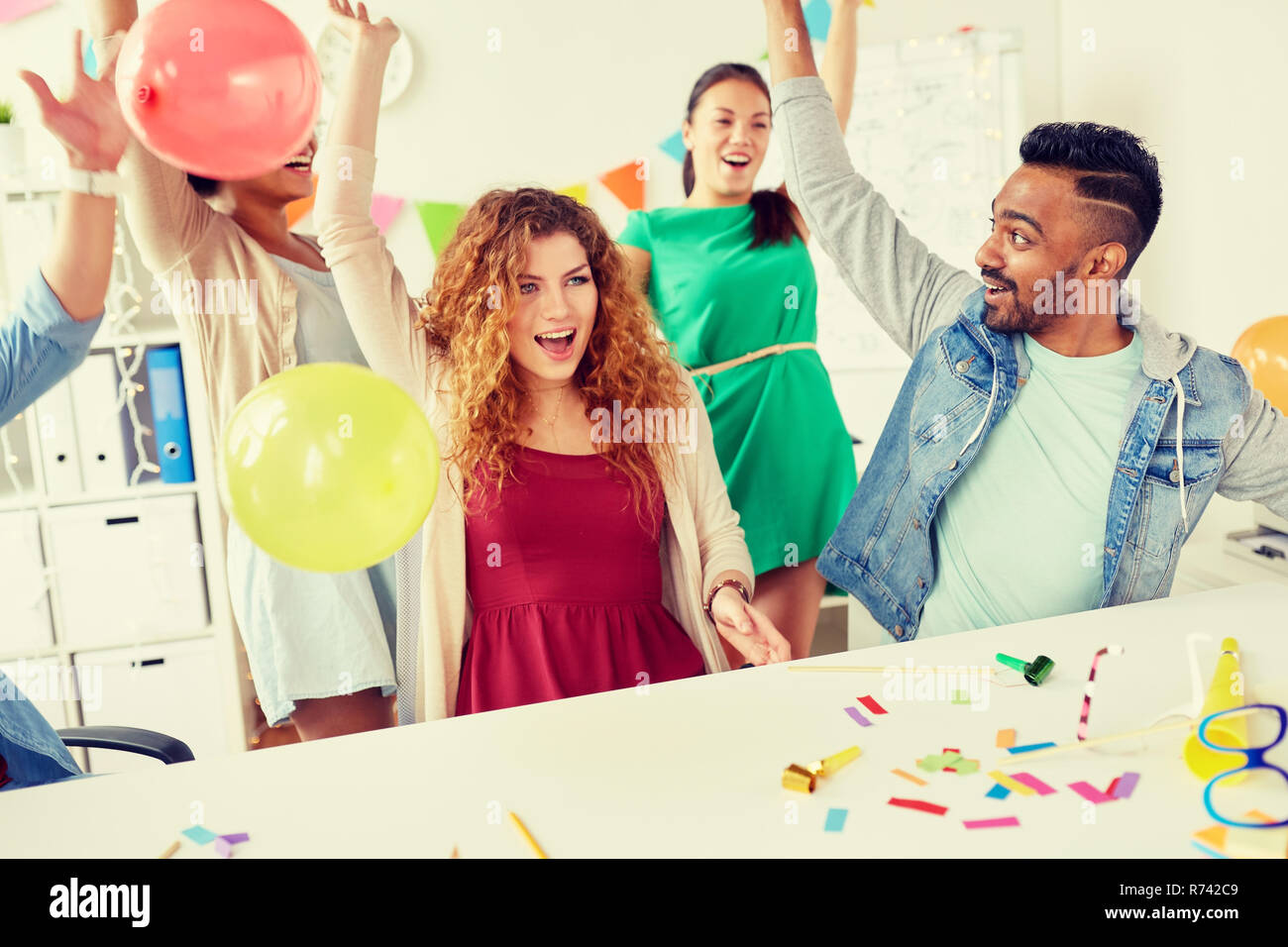 happy team having fun at office party Stock Photo - Alamy