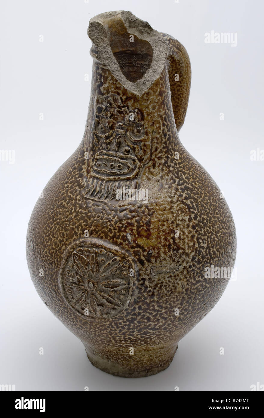 Brown speckled Bartmann jug, also called Bellarmine jug, under the ...