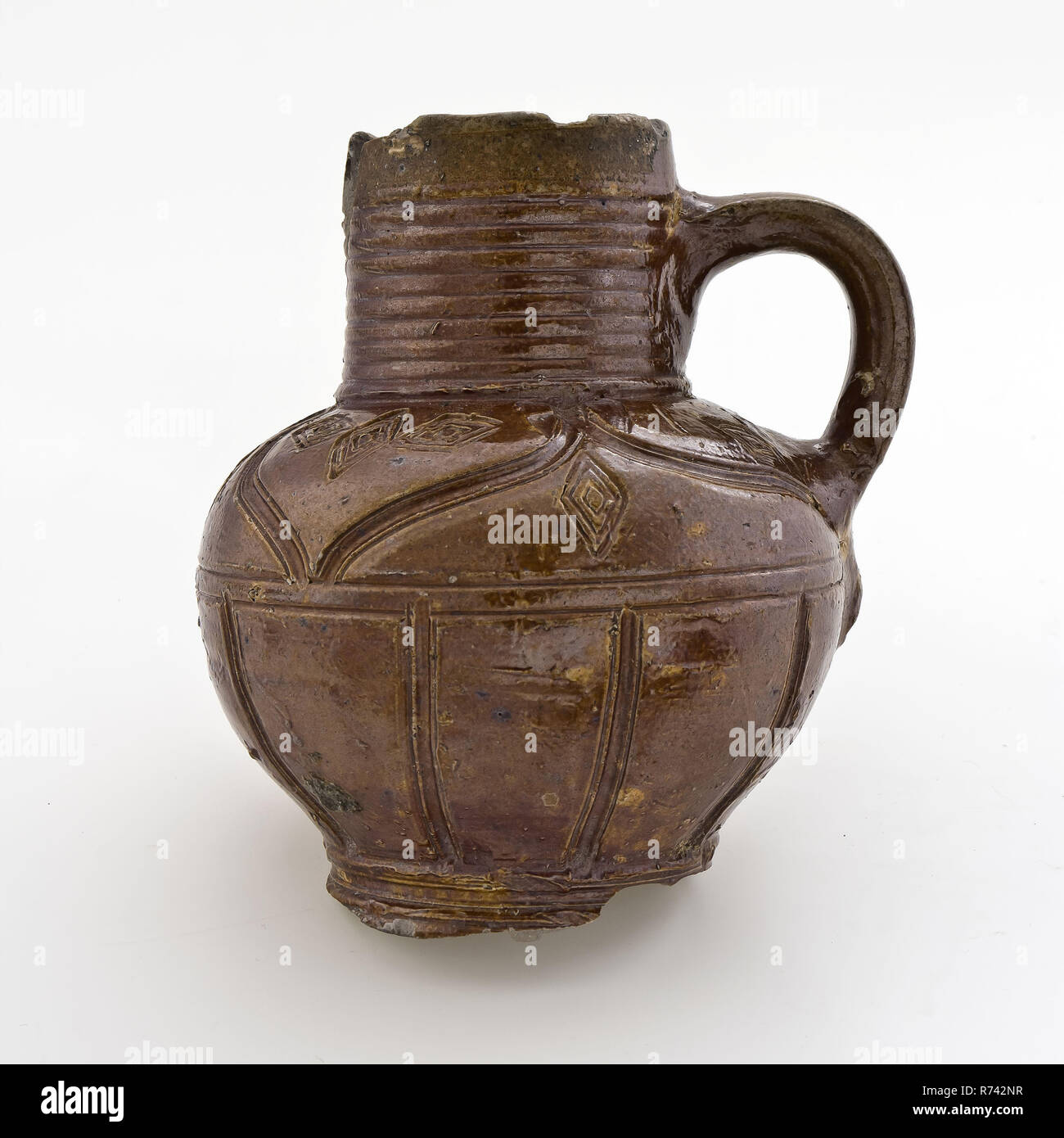 Brown stoneware jug with diamond-shaped stamps and flutes, jug crockery ...
