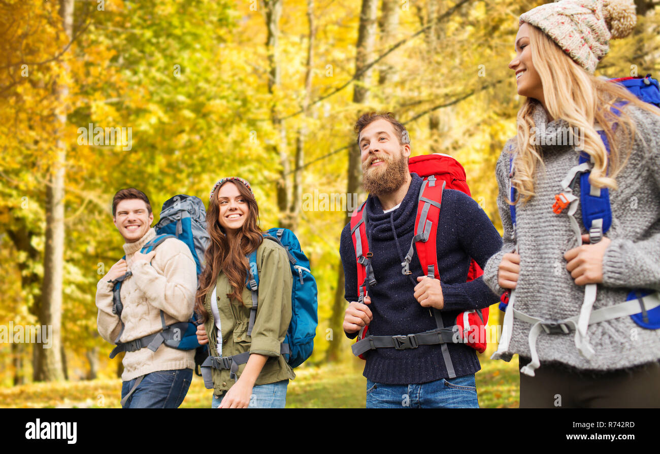hiking friends or travelers with backpacks Stock Photo - Alamy