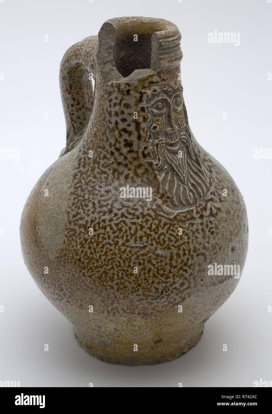 Brown speckled Bartmann jug, also called Bellarmine jug, with band ear ...